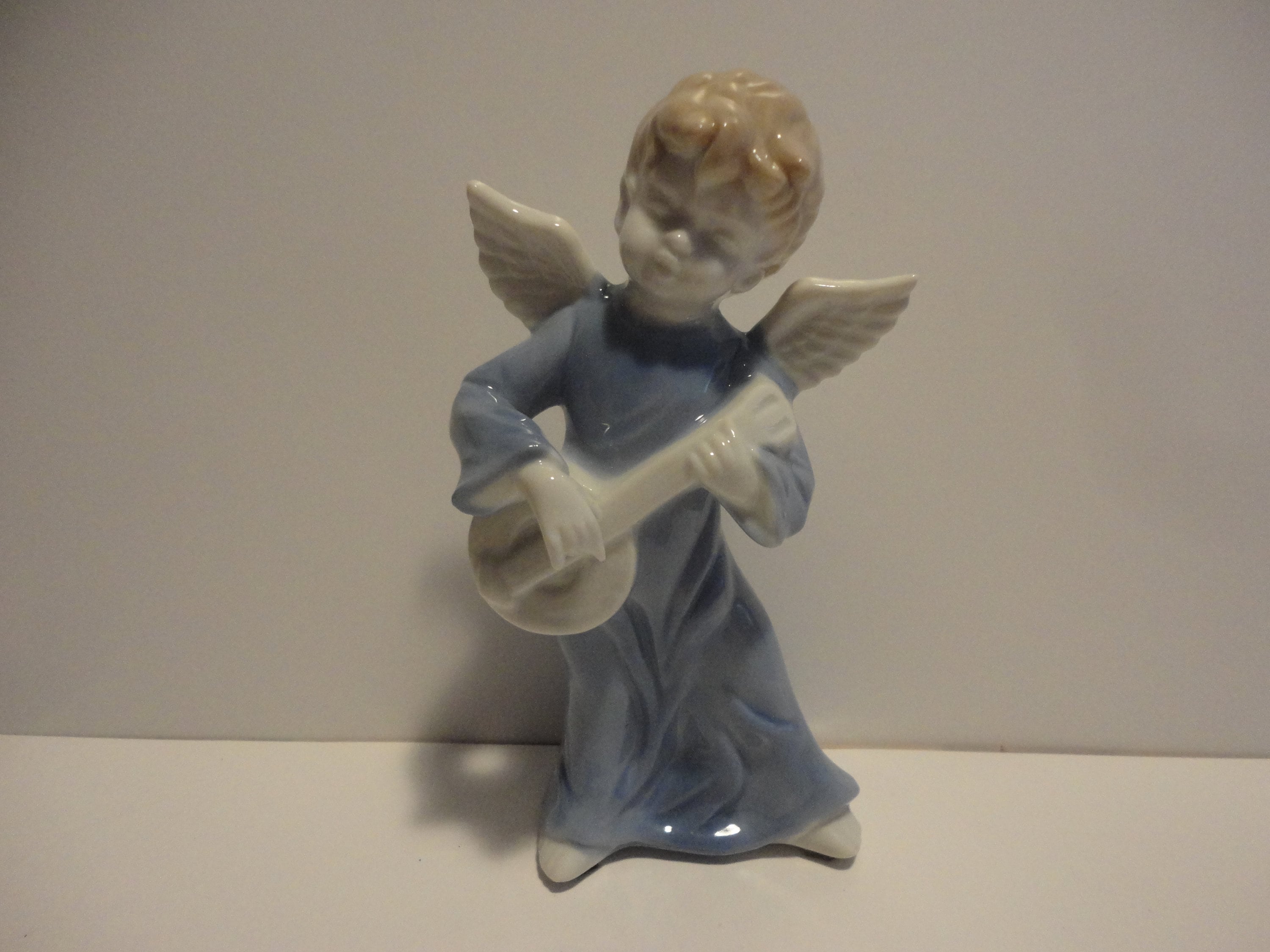 Trio of Blue and White Angels Playing Instruments Made in Japan ...