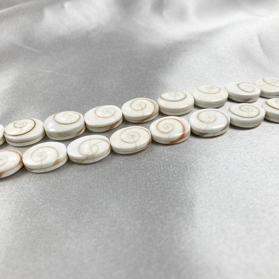 Doublet - Oval Shiva Shell Bead – Shiva Shell Bead - 16" Beaded Strand ...