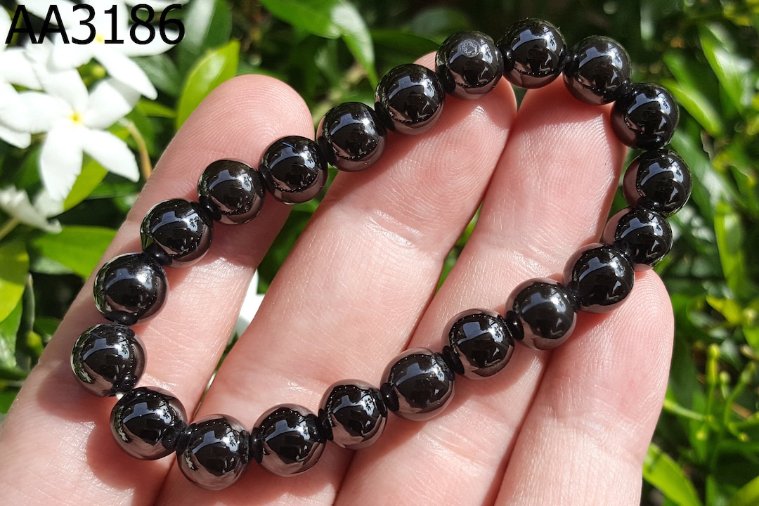 30g Mystic Black Energy Naga Eye Crystal Mala Beads Bracelet Prayer ...