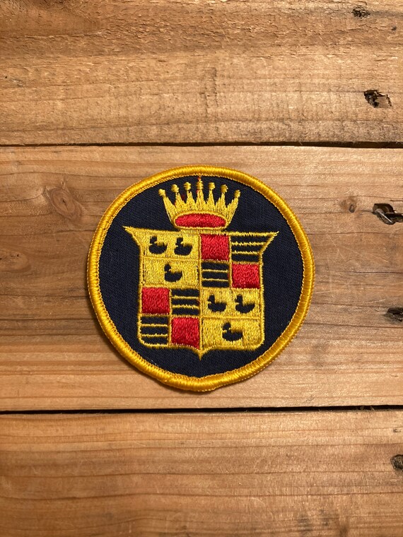 cadillac emblem crest - Gem