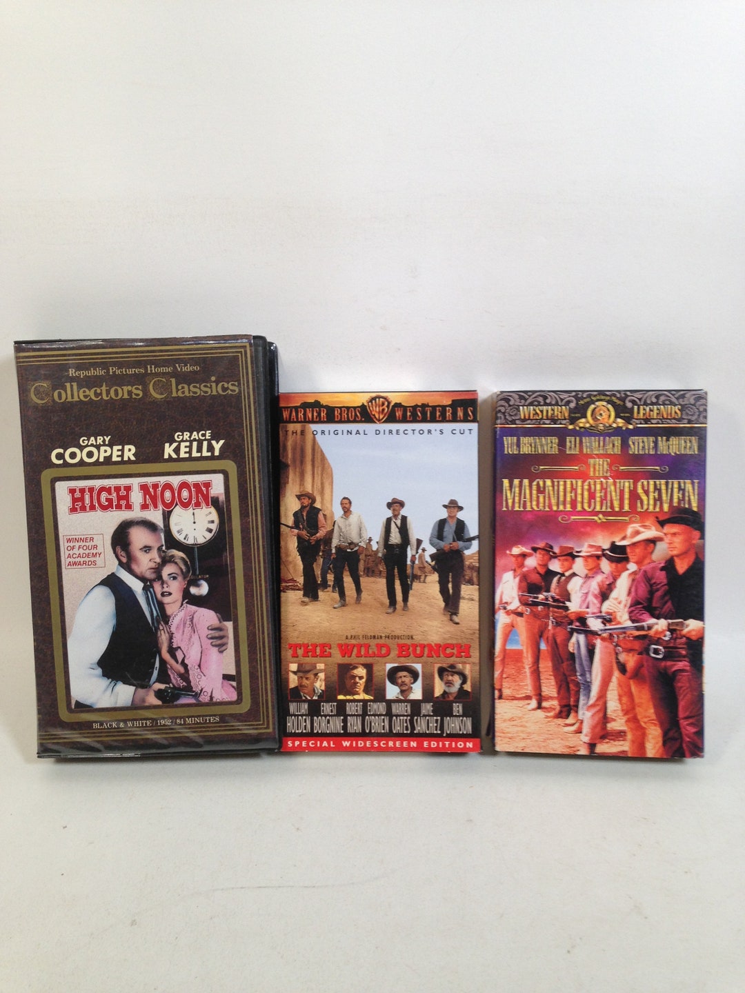 Three Western Movies on VHS Tape, the Magnificent Seven and 2 More ...