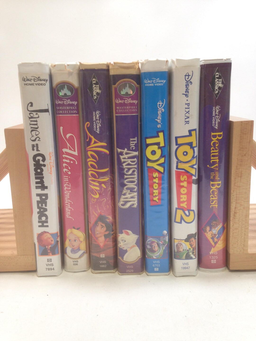 Lot of 7 Animated Disney Movies on VHS, Toy Story, Alice in Wonderland ...