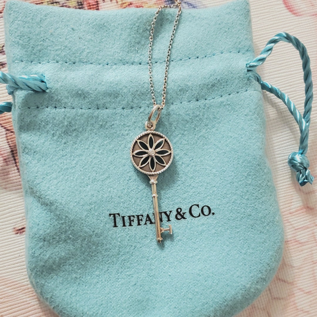 Authentic Tiffany & Co. Daisy Diamond Key Pendant and Sterling Silver ...