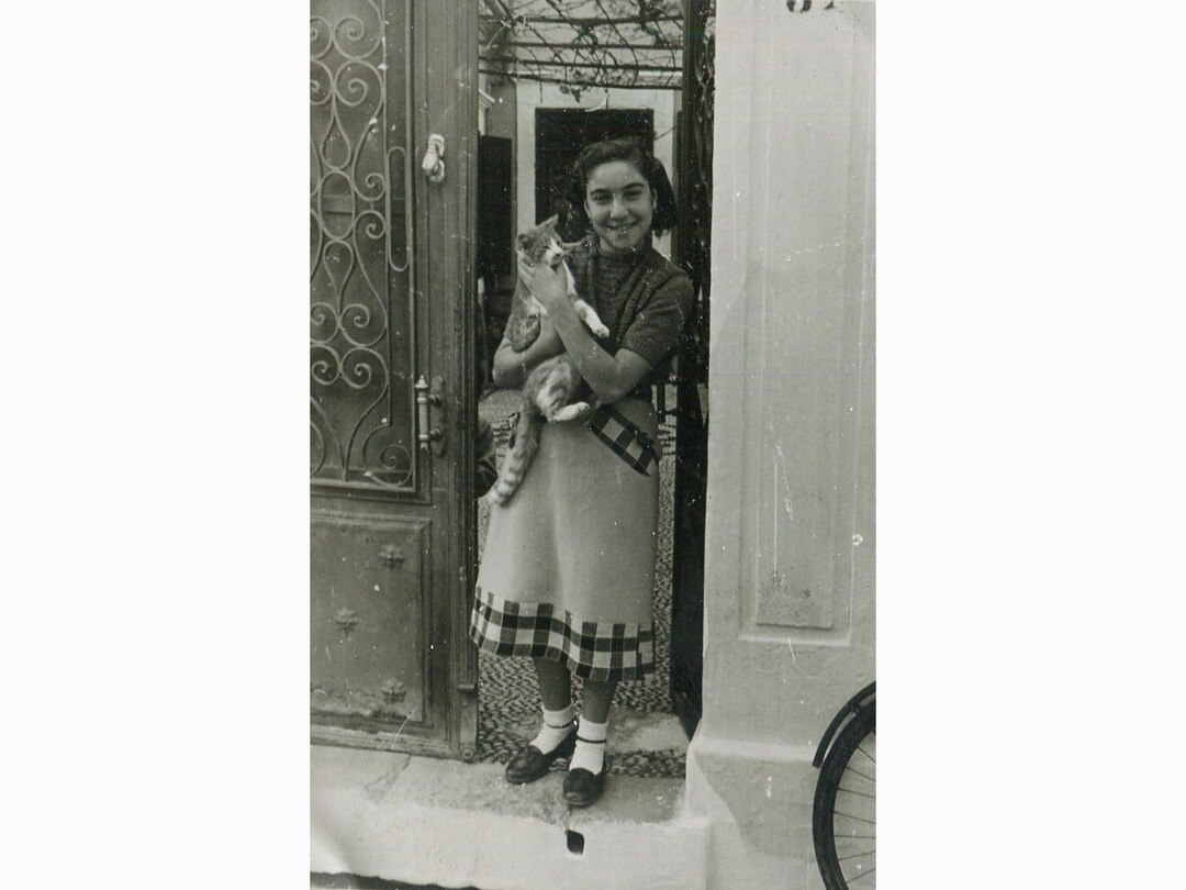 Little Niki With Her Cat (named Nino) in Front of the Front Door ...