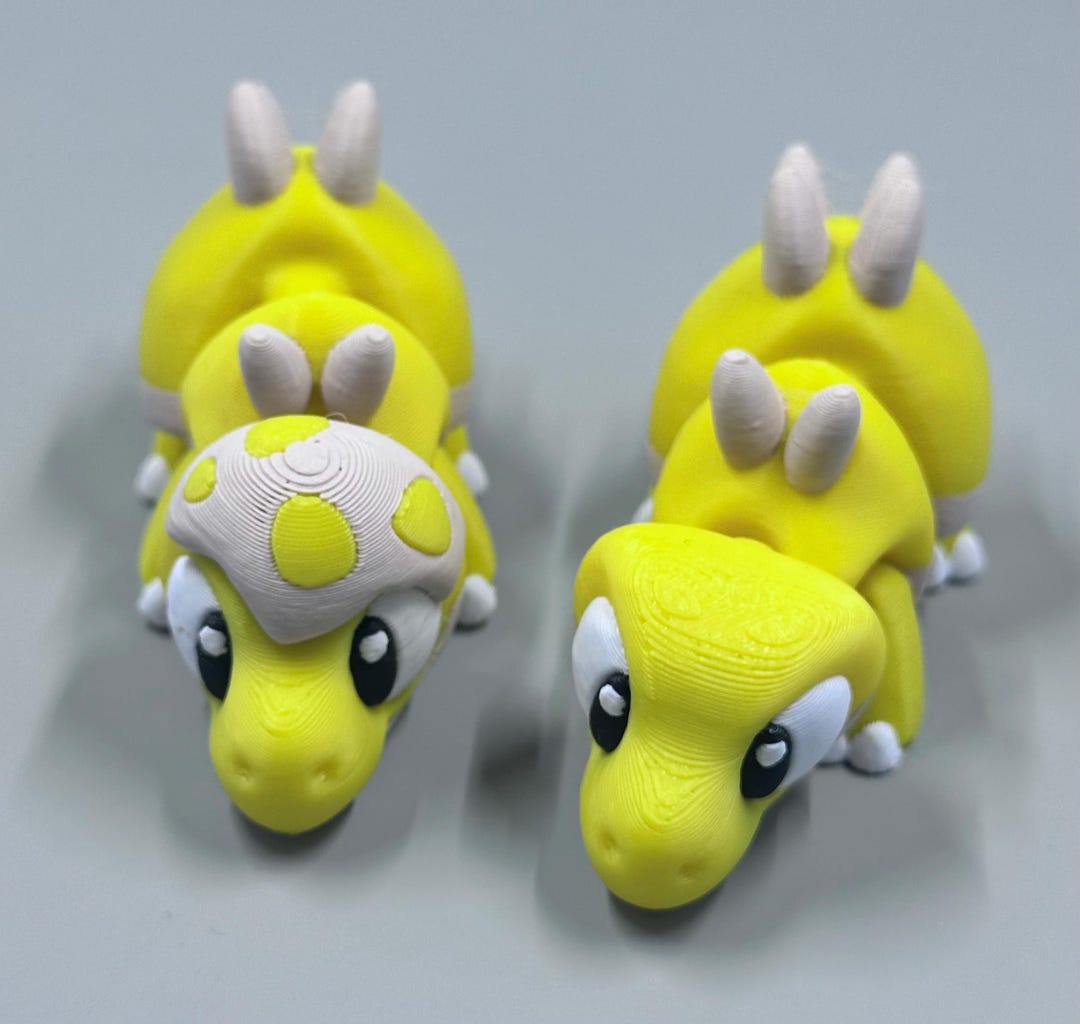 3D Printed Movable Baby Stegosaurus: Cute Dinosaur Toy in Yellow, Tan ...