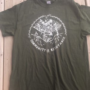 Community is Resistance T Shirt - Etsy