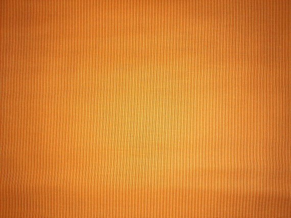 Hellgelbe Stoffstruktur