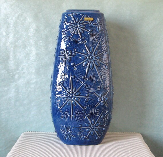 polvo Hay una tendencia Diariamente ceramica cosmos los medios de comunicación Figura