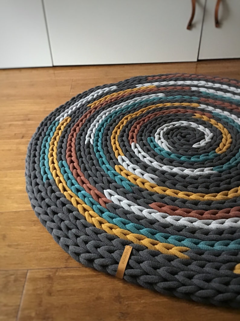 A Designer Round Rug, a Thick and Fluffy Rug in Vintage Colors, an ...