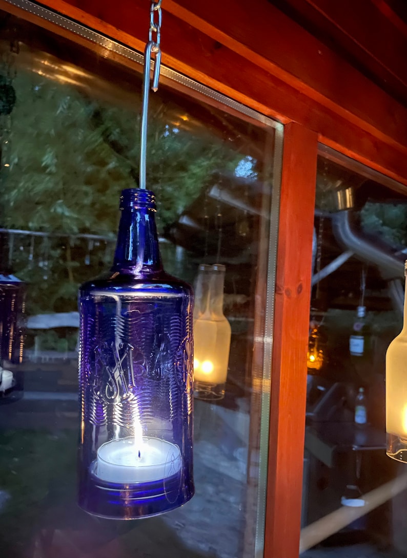 Lantern Made From an Italian Water Bottle - a Bottle Boy With Glass ...