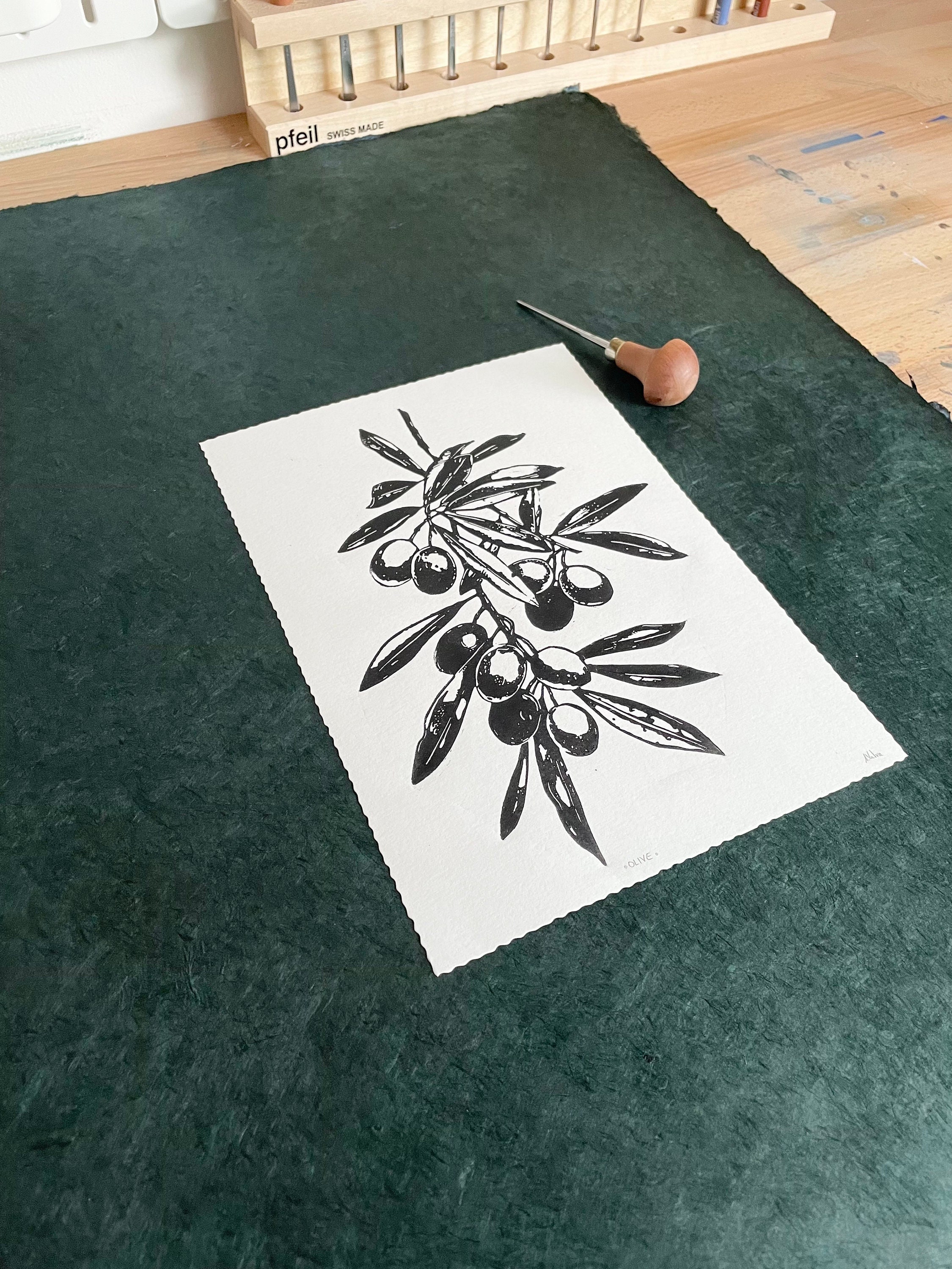 OLIVE TWIG black linocut on white paper (290g/m2) sold by Ki-Adi-Mundi ...