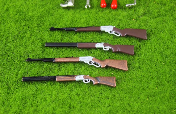 Miniature toy guns store
