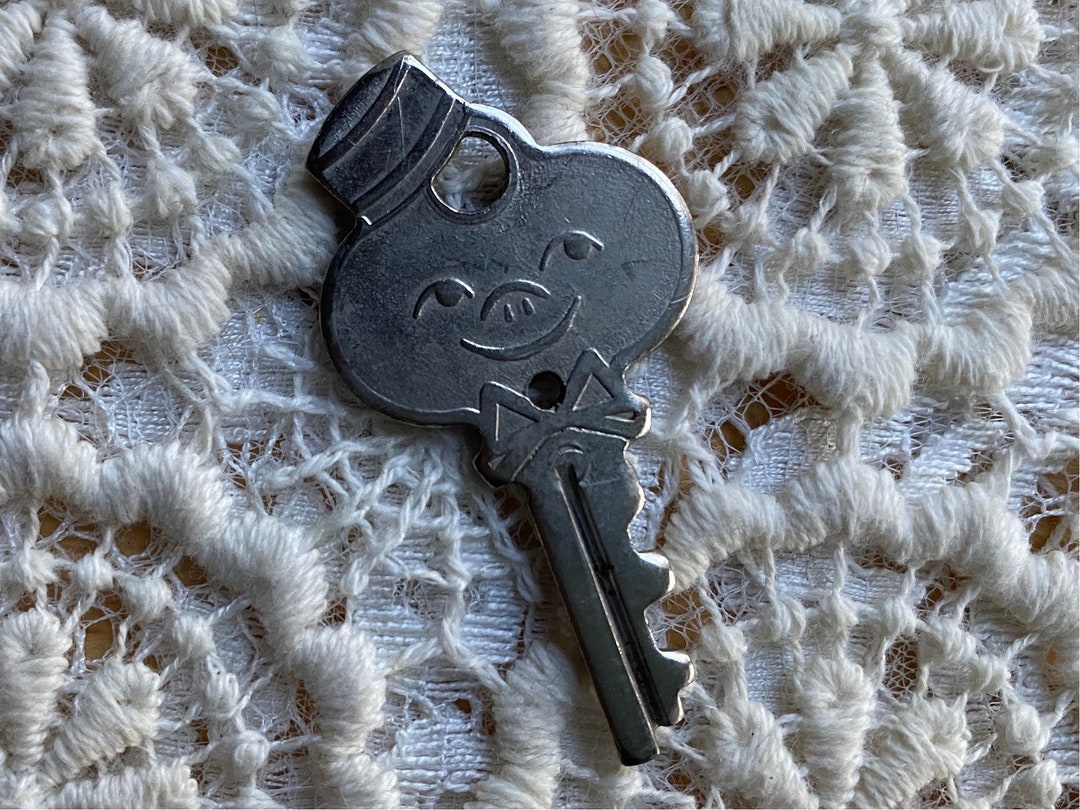 American Tourister Smiling Bellhop Key Vintage American Tourister ...