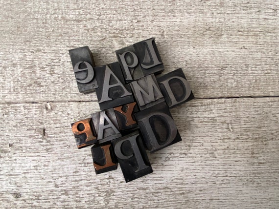 Antiqued Metal Letters And Symbols