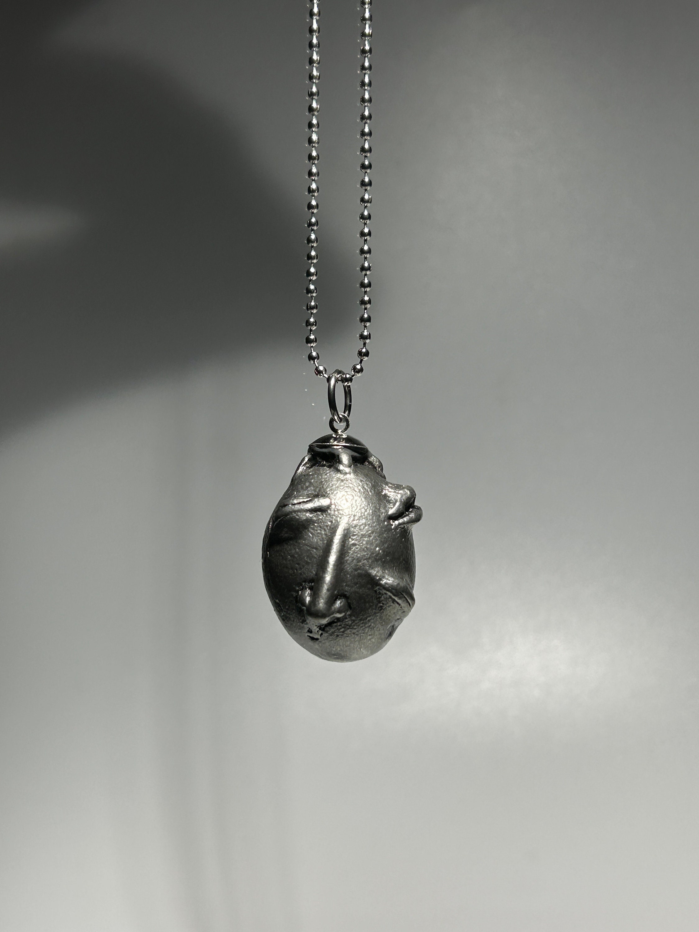 Berserk Behelit Necklace
