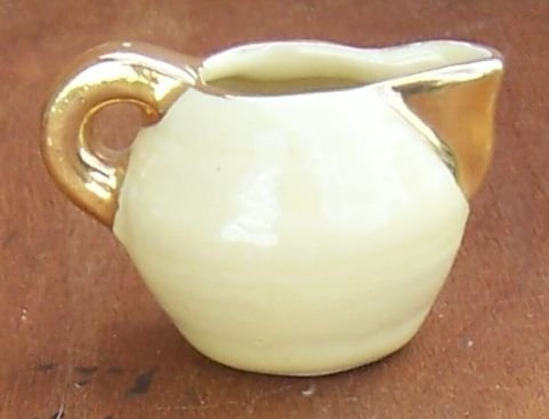 Miniature Pottery Pitchers Yellow With Gold Top, White Lustre Glaze ...
