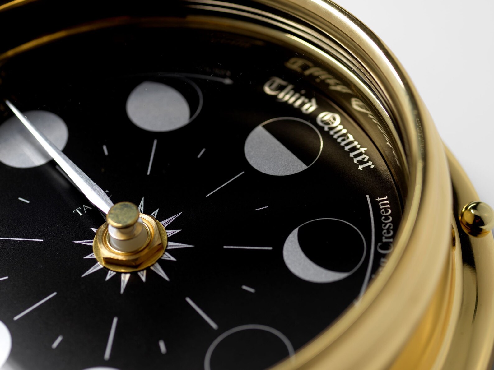 Prestige Brass Moon Phase Clock With a Jet Black Dial Mounted on a ...