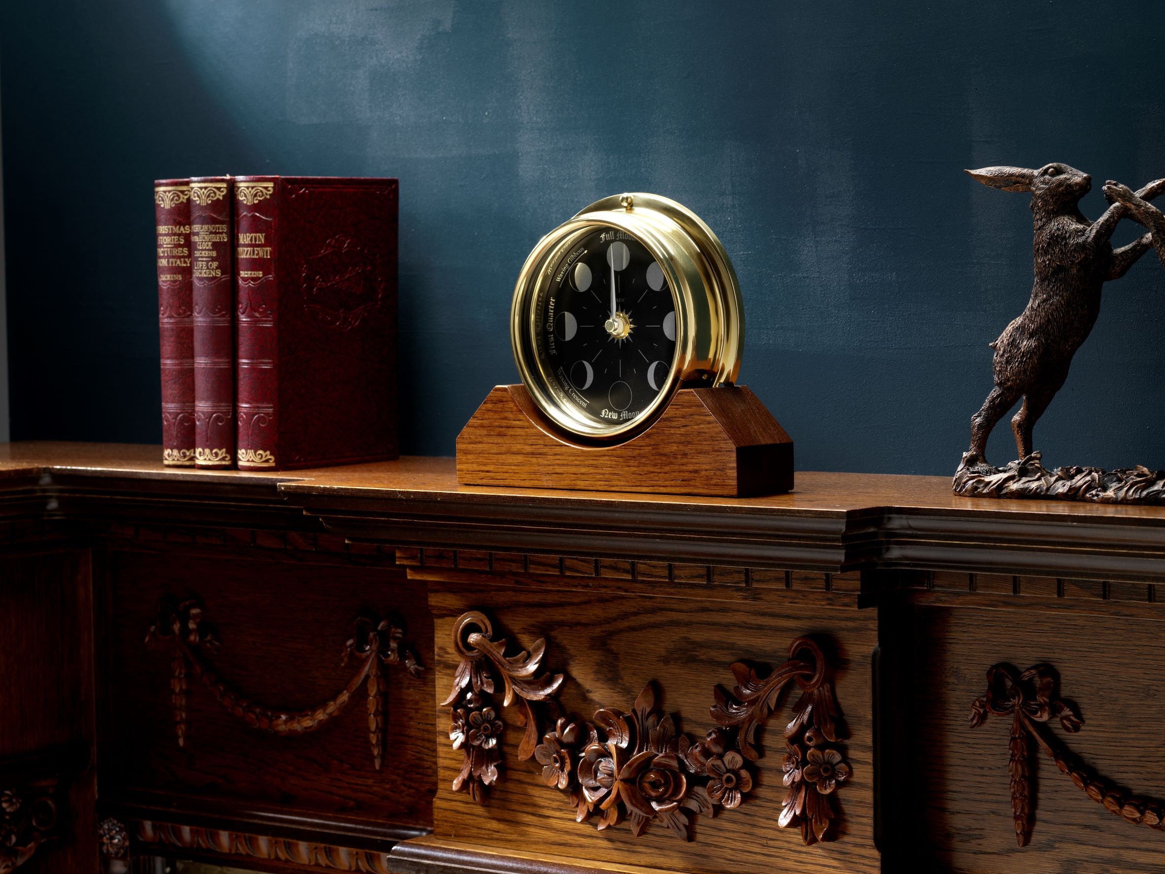 Prestige Brass Moon Phase Clock With a Jet Black Dial Mounted on a ...