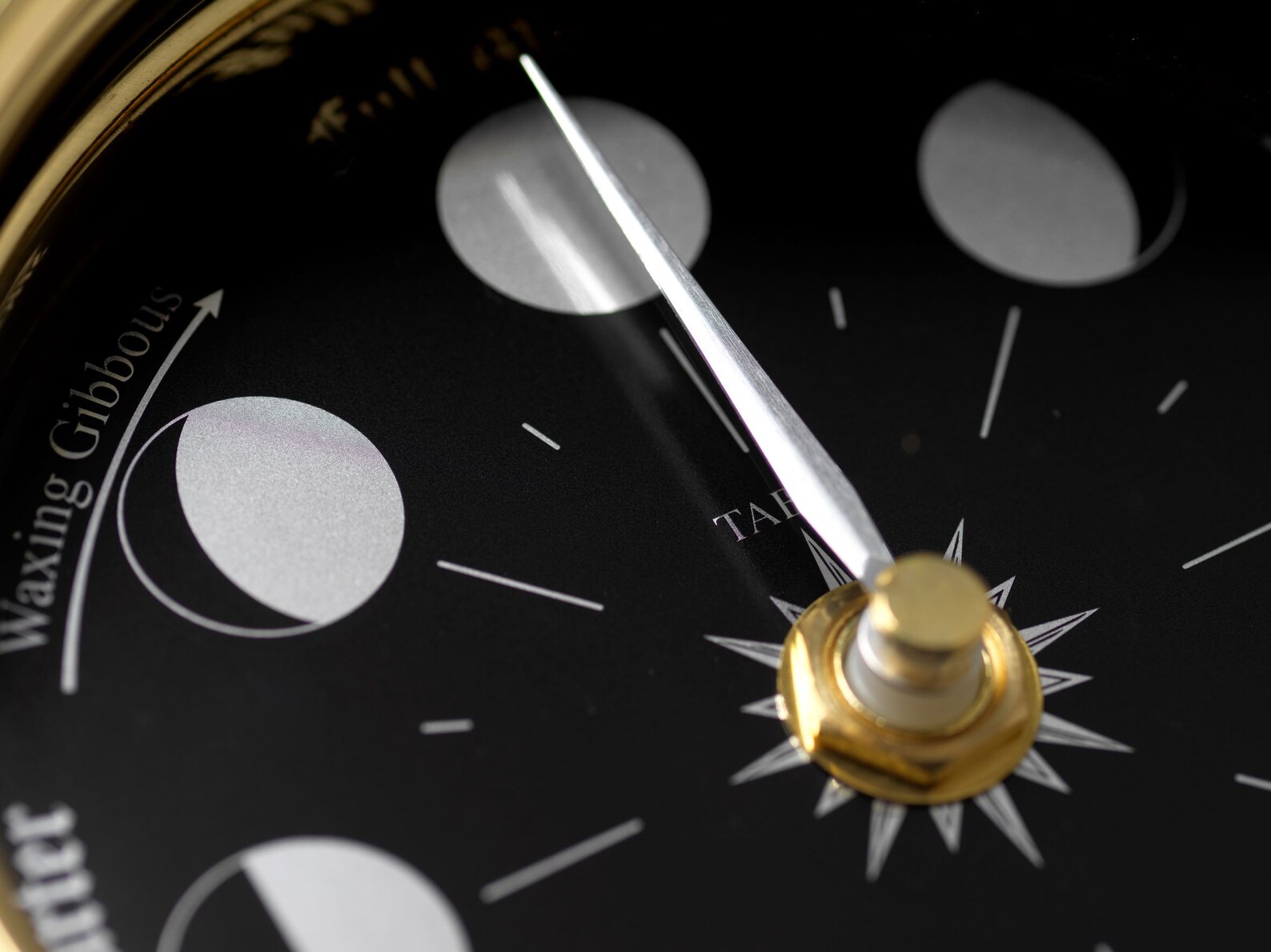 Prestige Brass Moon Phase Clock With a Jet Black Dial Mounted on a ...