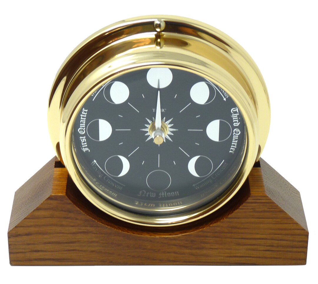 Prestige Brass Moon Phase Clock With a Jet Black Dial Mounted on a ...
