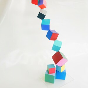 Sculpture Wood Art. Bold and Colorful Artwork. 3D Art. Colored Cubes ...