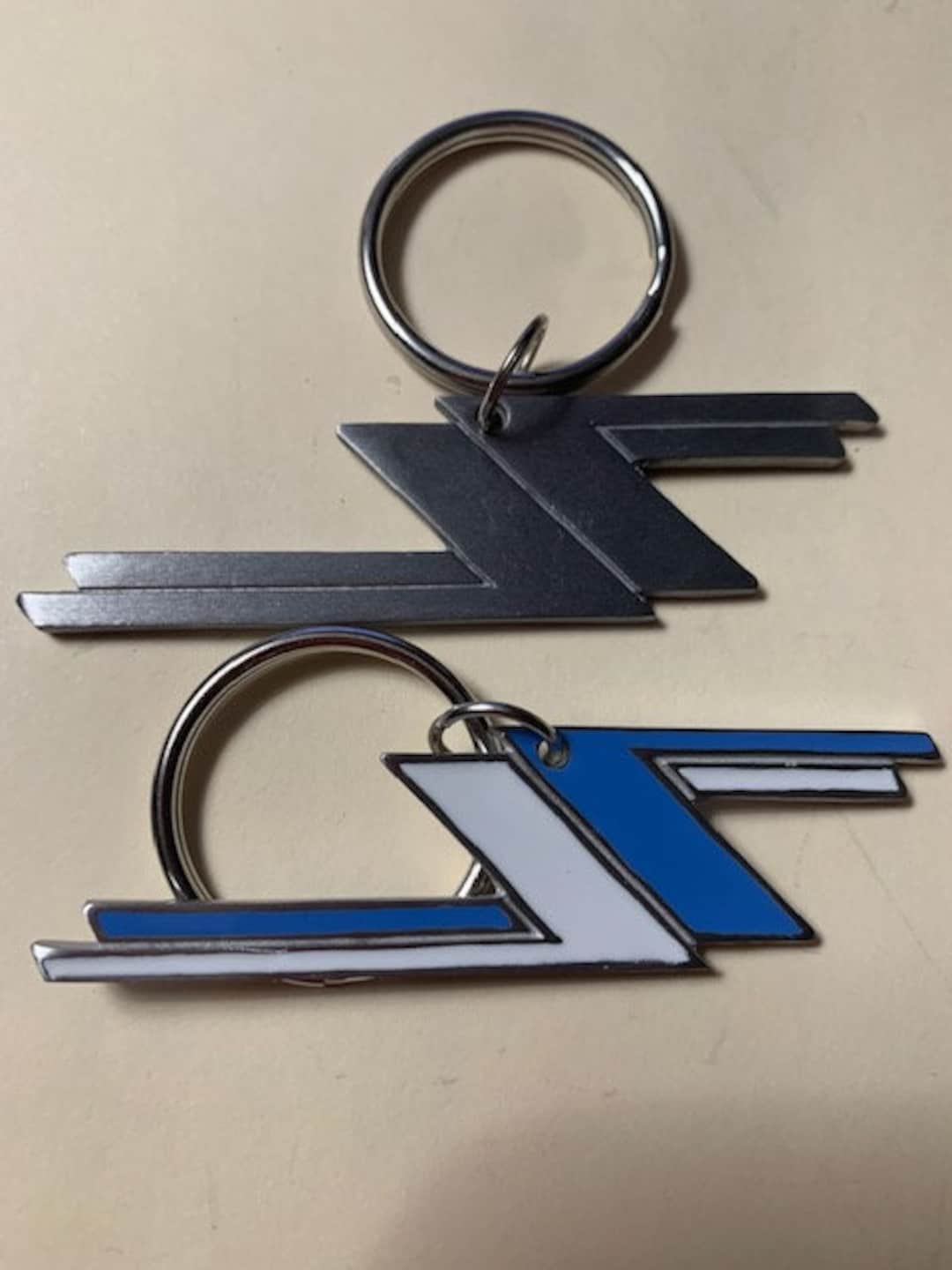 SET OF 2 ZZ Top Teal Blue and White and A Plain Silver Key Chain Solid ...