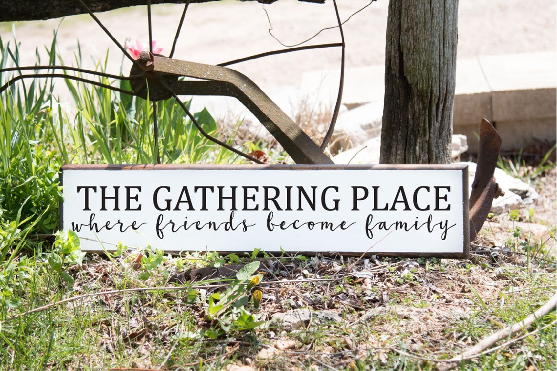 The Gathering Place Where Friends Become Family Farmhouse Sign - Etsy