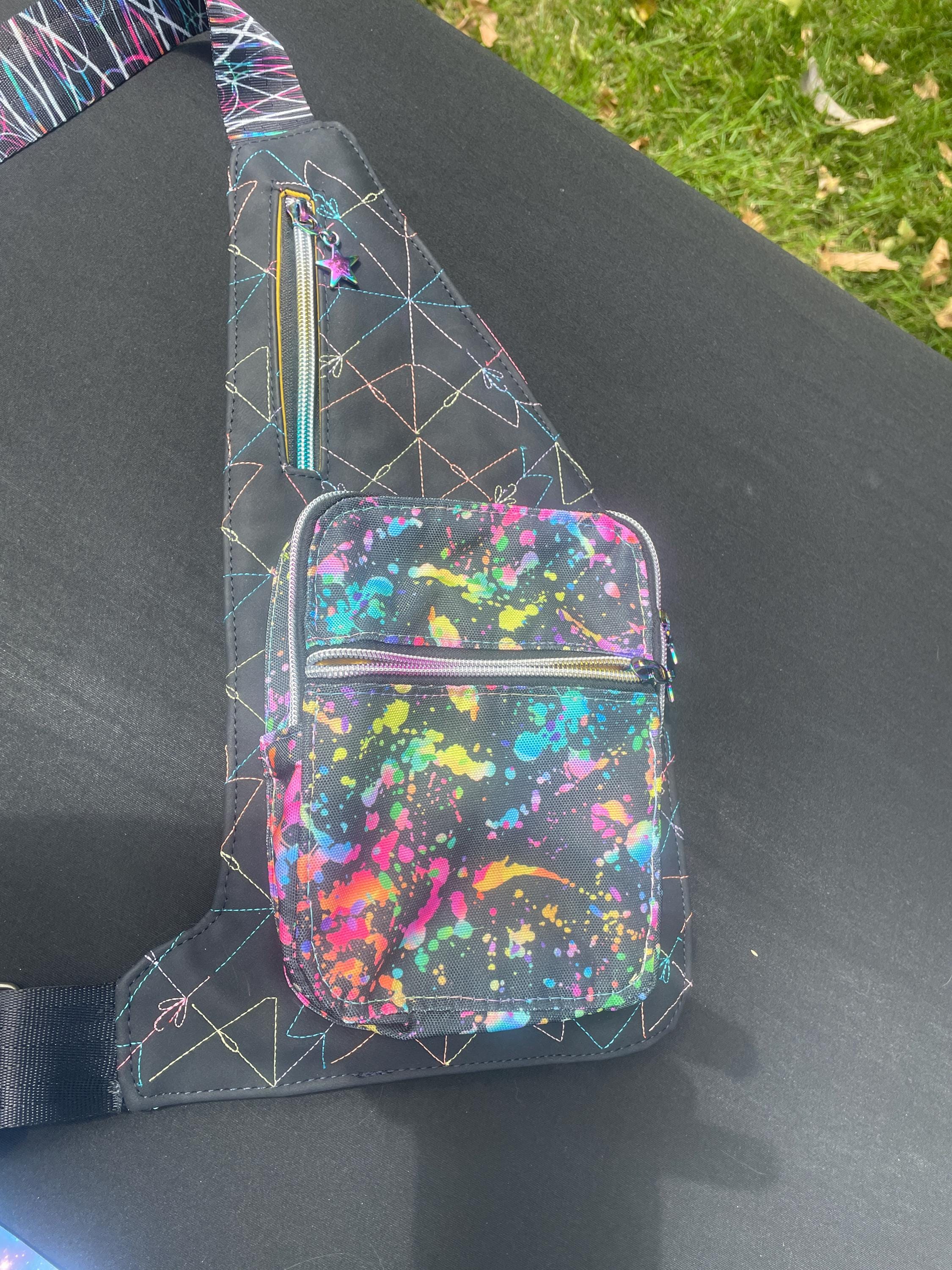 Wanderlust Sling Backpack in a Colorful Pattern. Multiple Pockets for ...