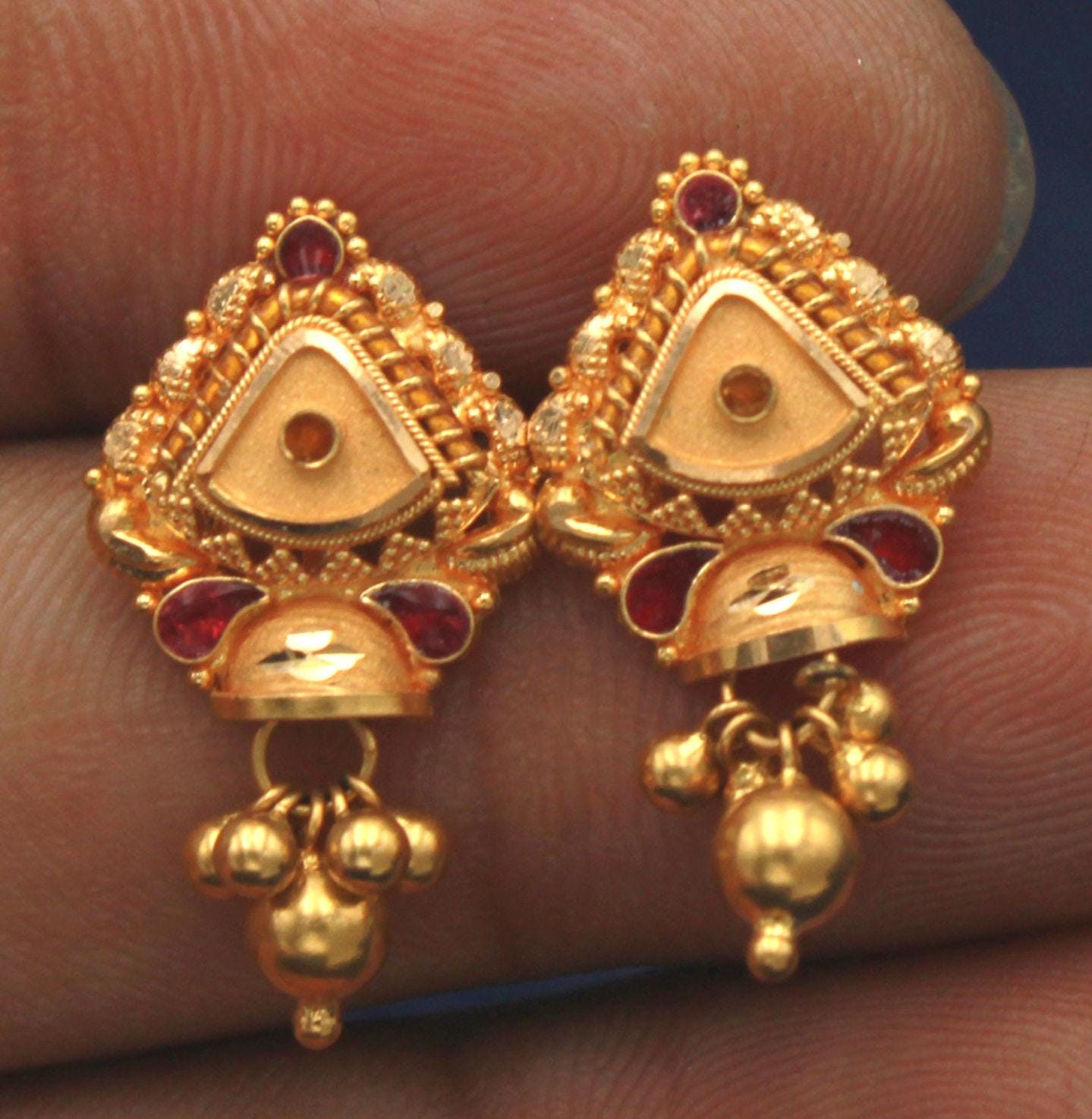 Gold ki earrings store