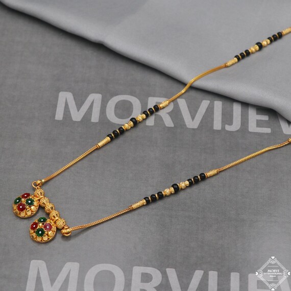 Latest gold black beads mangalsutra store