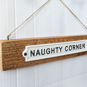 Cute White Cast Iron " Naughty Corner" Sign on Authentic Barn Wood ...