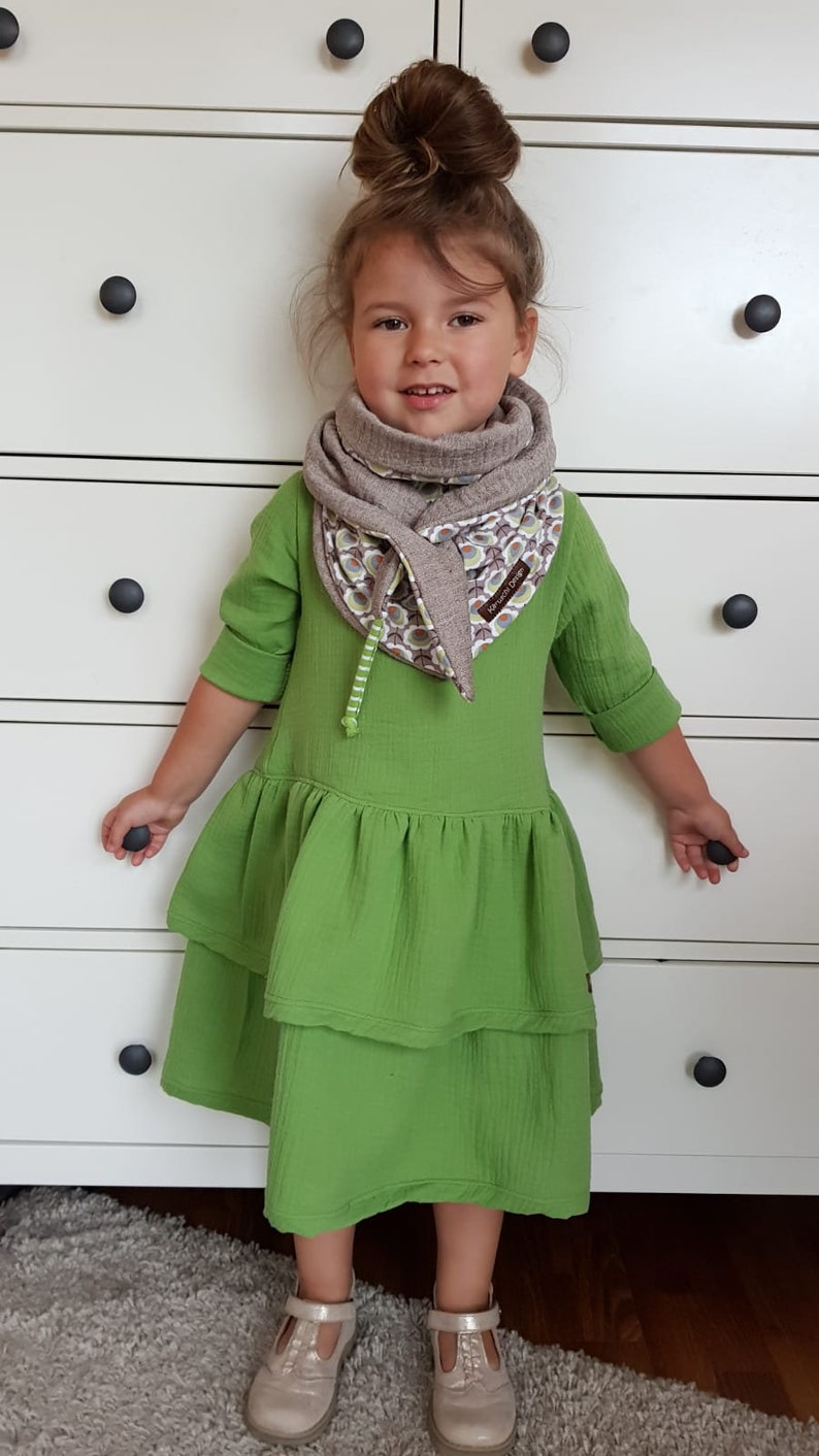 Spannende Kleid Mit Dreiviertelarm Bild
