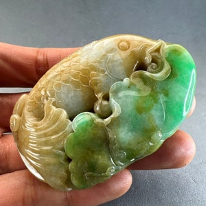 Jadeite Carving: Natural Jade Carving of a Koi Fish Swimming Along the ...