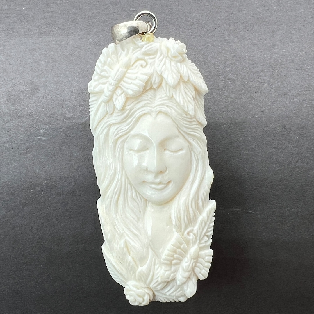 Moose Antler Carving of a Pendant: Goddess and Butterflies, Finely ...