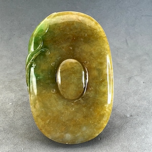 Jadeite Carving: Natural Jade Carving of a Koi Fish Swimming Along the ...