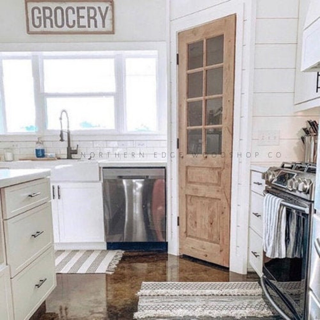 Pantry door that looks like cabinets store