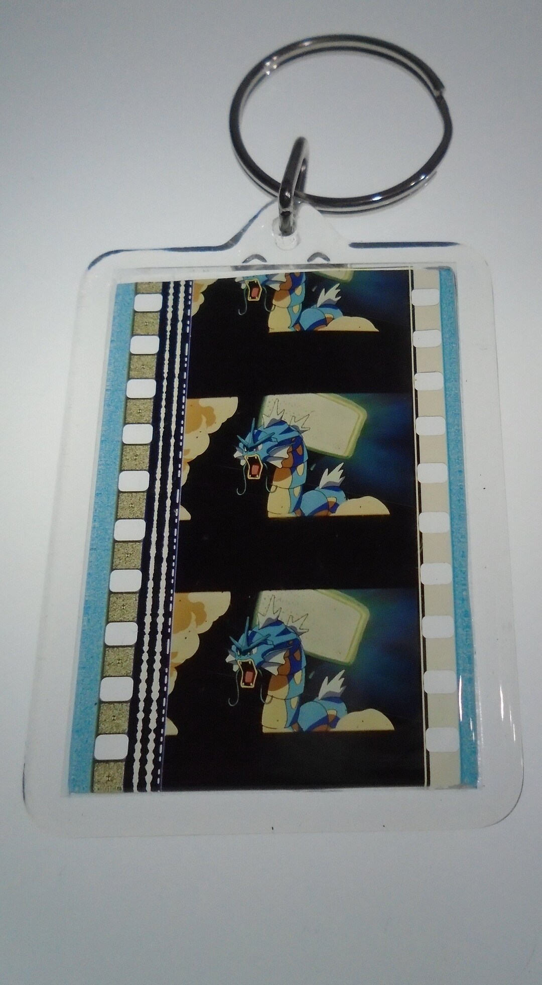 Pokemon the First Movie Film Cell Keyring. Genuine 35mm Film Cells ...