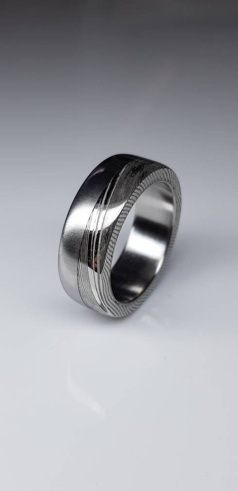 Solid pure Titanium rings with a stainless Damascus Steel | Etsy