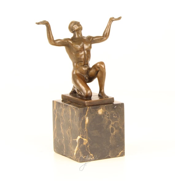 A Bronze sculpture of a kneeling Adonis | Etsy