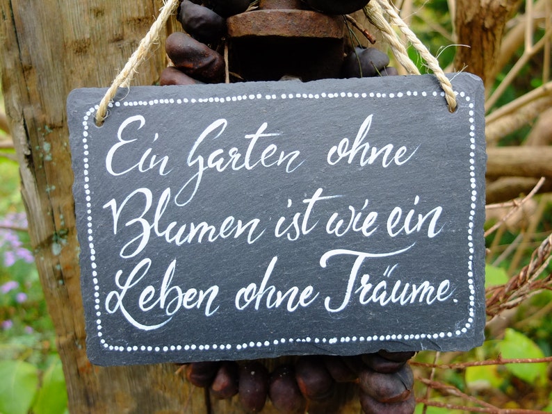 Spannende Schiefertafel Mit Spruch Bild