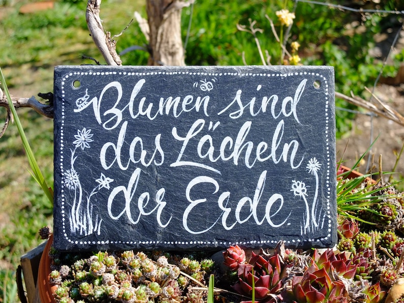 Spannende Schiefertafel Mit Spruch Bild