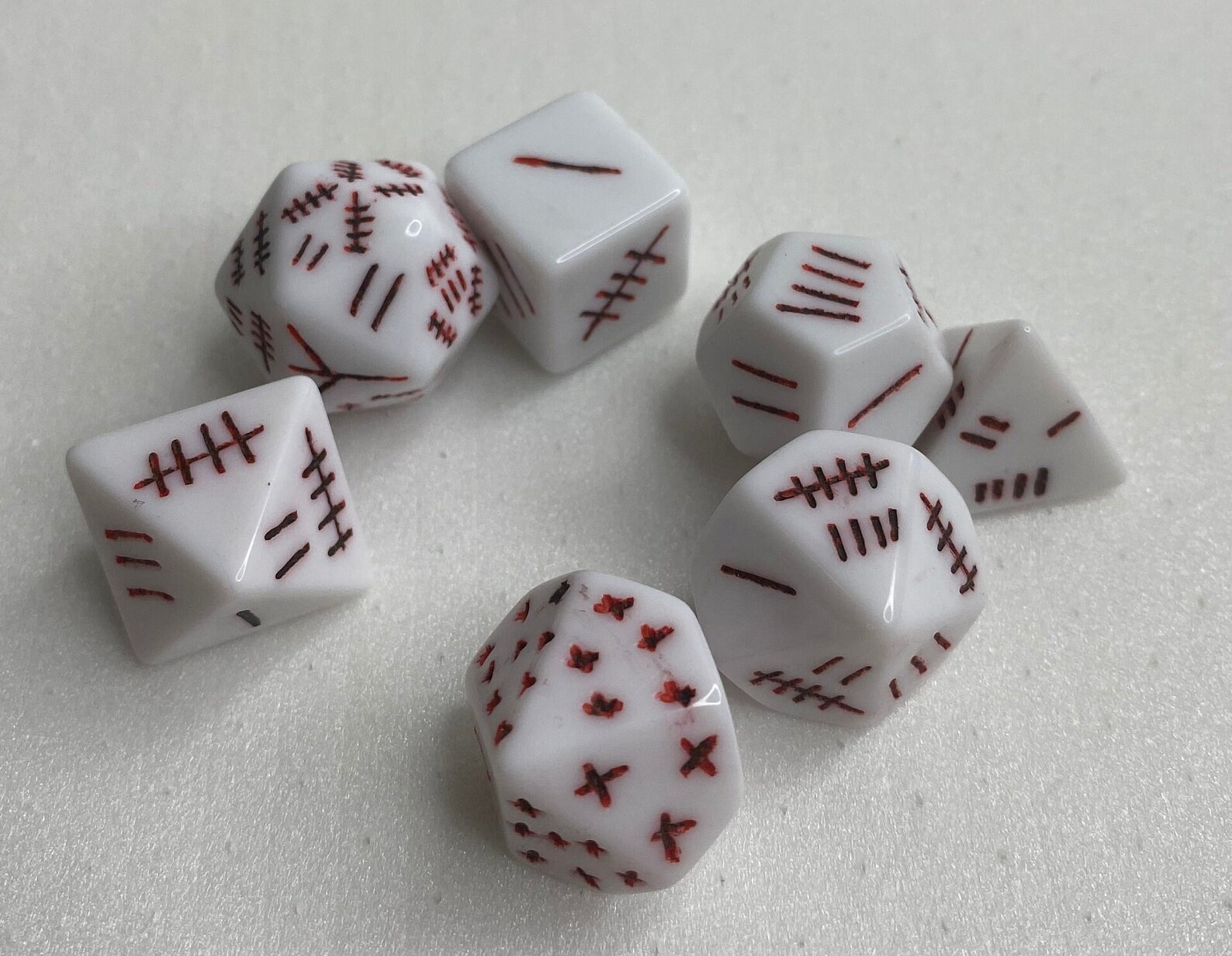 7 Piece Polyhedral Dice Set. Knucklebones of Bawwwk. White Dice With ...