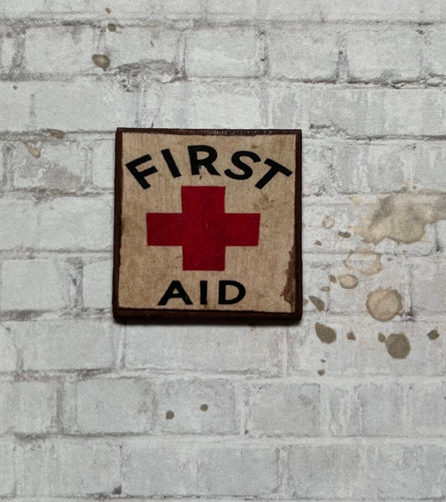 Red First Aid Kit Sign