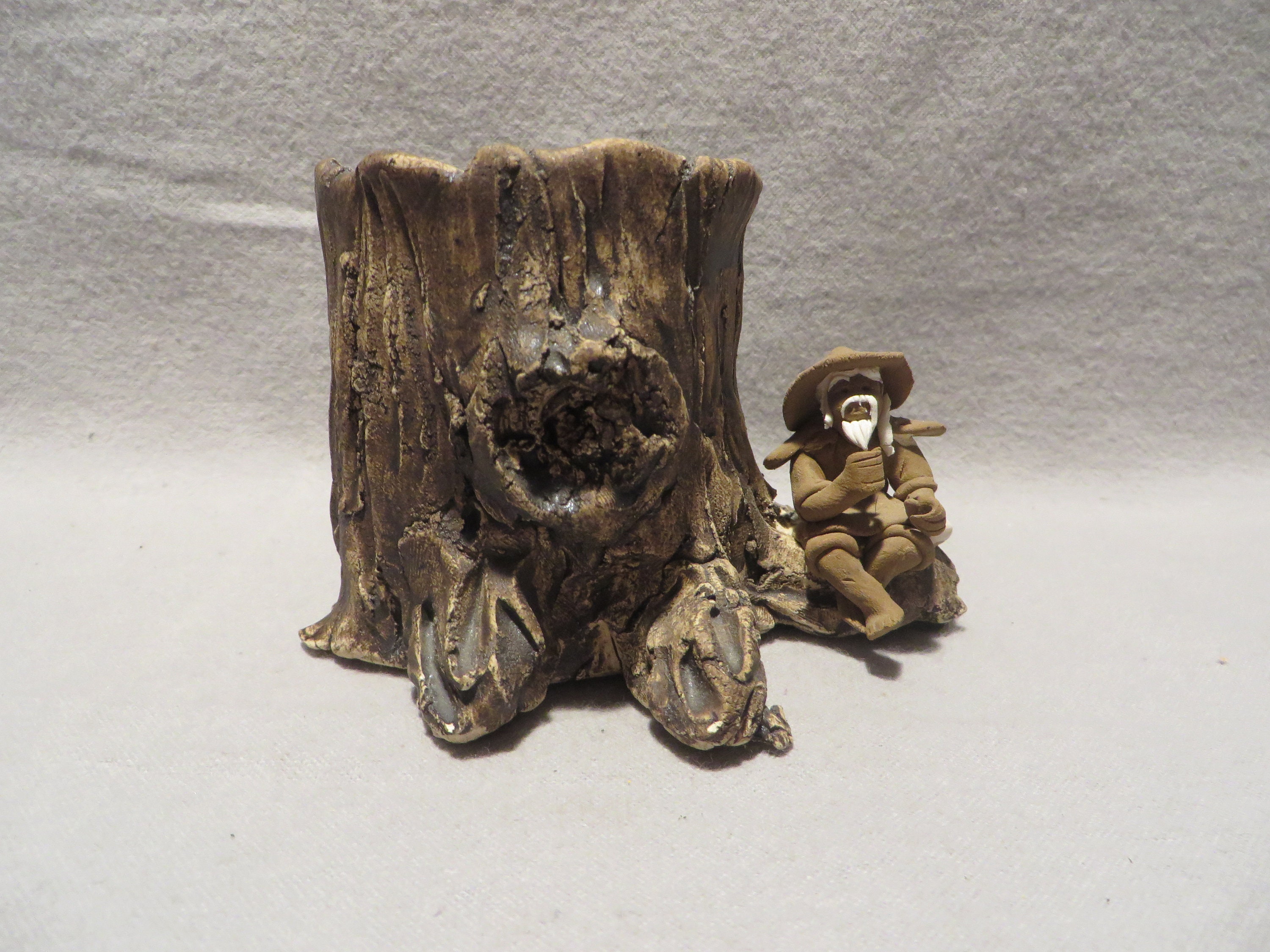 Vintage Oriental Miniature Mud Man Figurine Sitting on a Tree Stump ...
