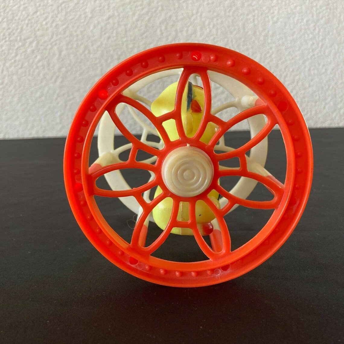 Vintage Plastic Rolling Wheel Toy With Doll in the Center - Etsy UK