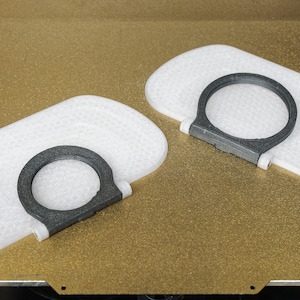 A compact macro flash diffuser panel for the Olympus 60mm or 90mm Macro ...