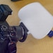 A compact macro flash diffuser panel for the Olympus 60mm or 90mm Macro ...