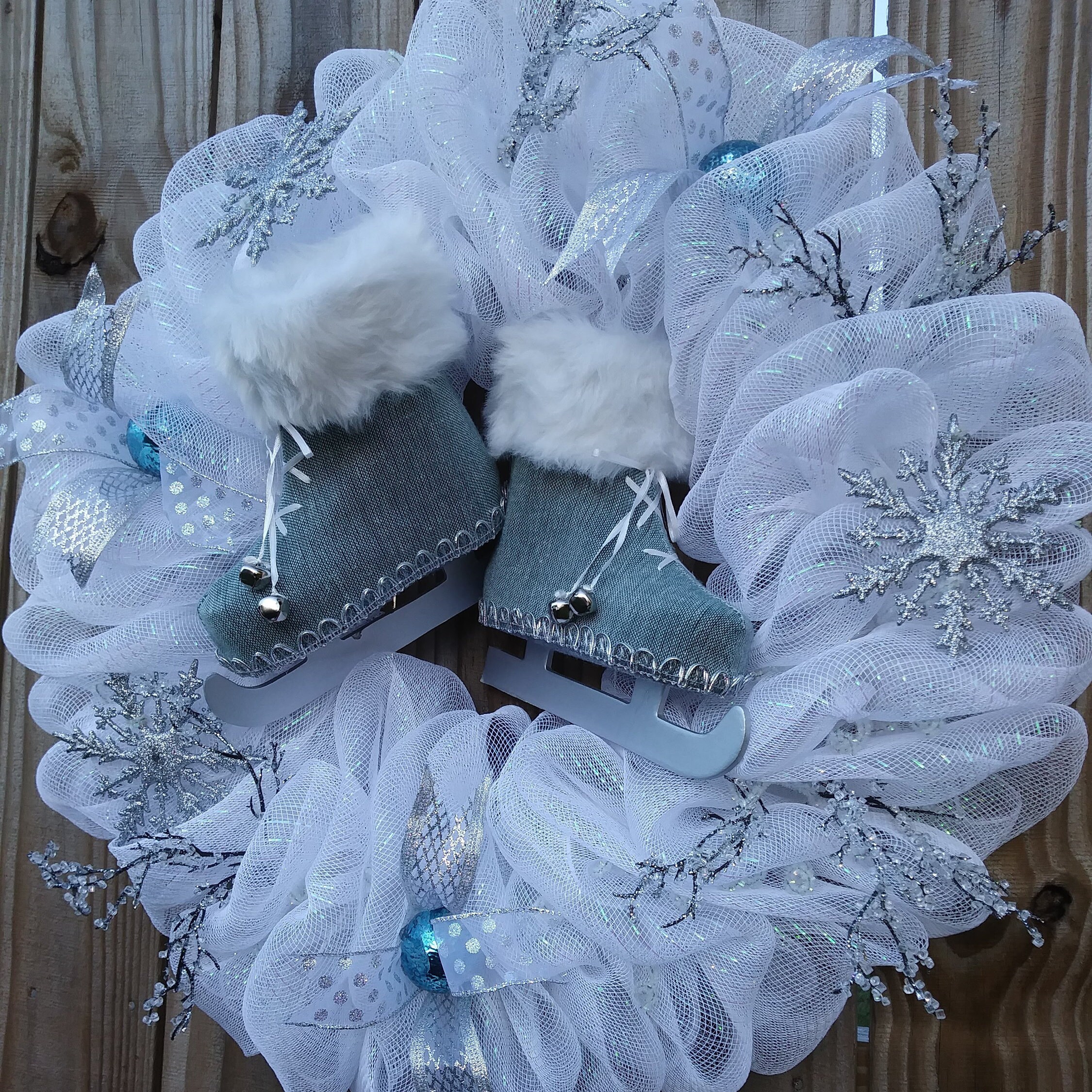 Ice Skates on White Wreath. Snowflake and Icicle Wreath. Blue Skates on ...