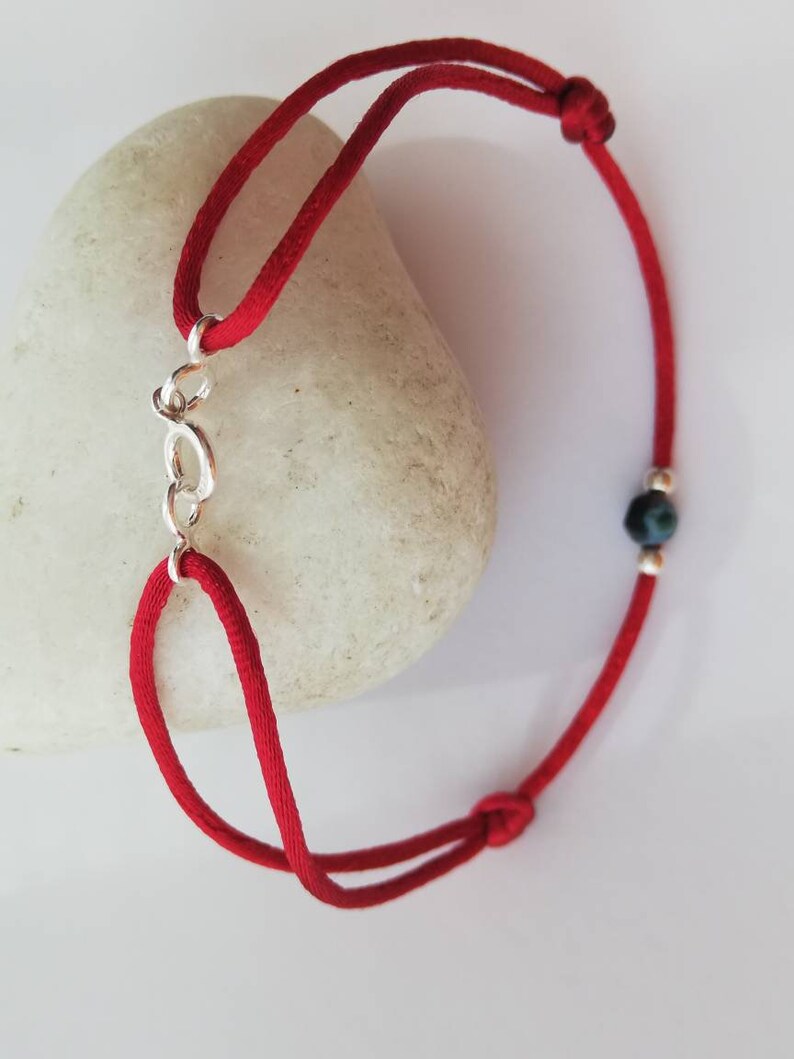 Kabbalah red thread. May Birthstone women's bracelet. | Etsy