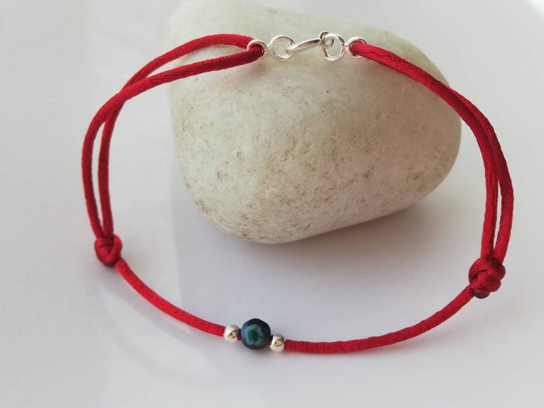 Kabbalah red thread. May Birthstone women's bracelet. | Etsy